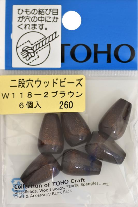 TOHO 二段穴 ウッドビーズ 約12×18mm ブラウン 6ヶ入り W118-2サイズ：約12×18mm穴のサイズ：約5mm・8mm色番：W118-2 ブラウン容量：6ヶ素材：木製水洗い、塩素サラシ、アイロン、ドライクリーニングなどのご使...