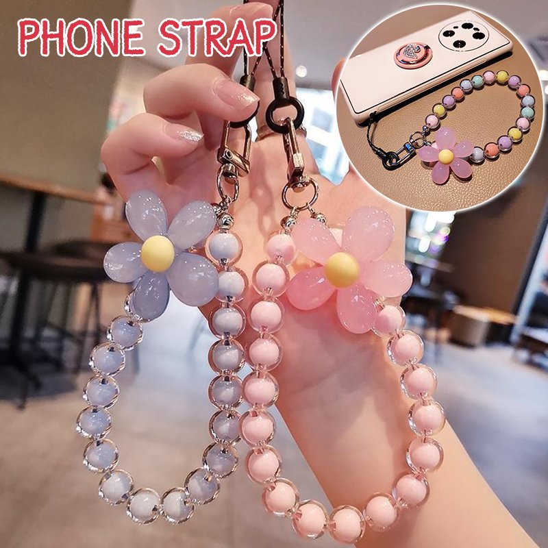 レディース用手首掛けスマホストラップが スマホの落下や紛失防止や、両手をリリースためのマストアイテム 可愛いマカロンカラーの数珠デザインでブレスレットのようなおしゃれ感 一目見て誰でも分かる簡単な着脱方法も嬉しいポイント 付いたままで充電可...