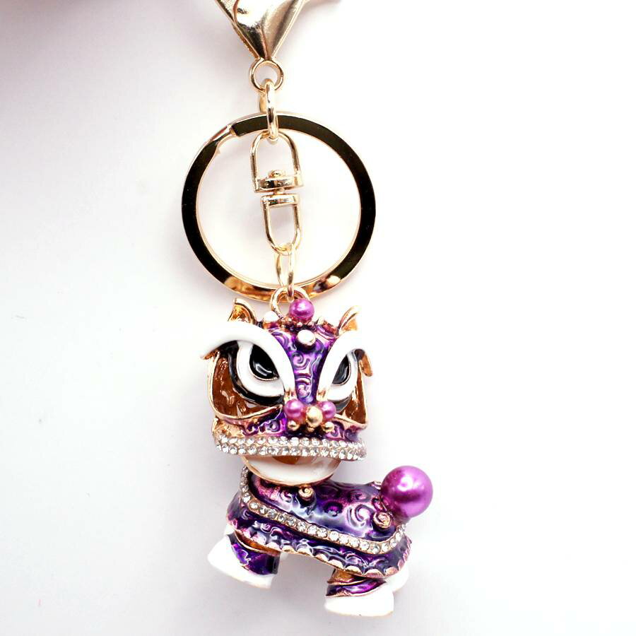 亜鉛合金製で光沢のあるラインストーンが鮮やかな獅子舞の形のキーホルダー 材質:亜鉛合金 本体の大きさ：約11cm×4cm 重量：約45g