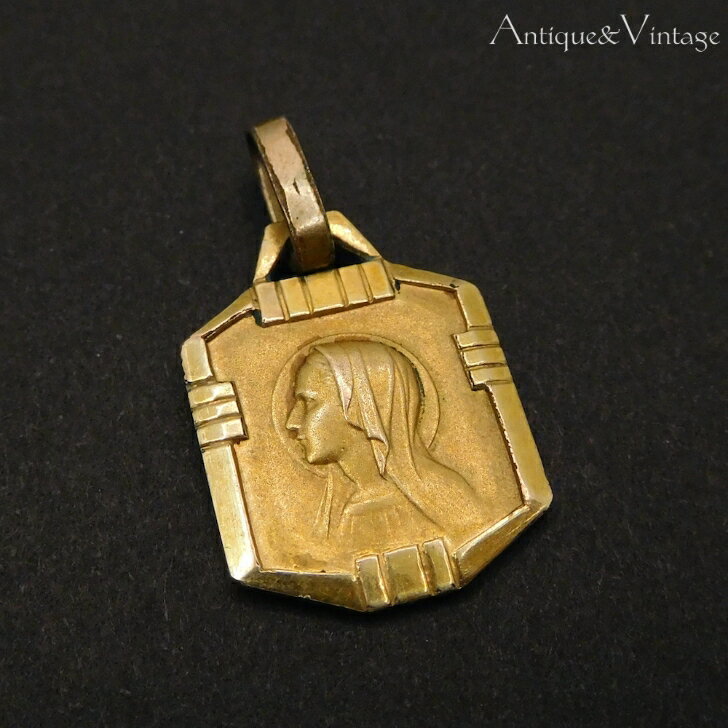 聖母マリアのアンティークメダイです。カテゴリー：アンティーク＆ヴィンテージ製造国：フランス製造年：ーカラー：ゴールド素材：合金メタルサイズ：縦約1.8(1.5)cm×横約1.3cm状態 ※：普通（経年劣化／裏の縁のメッキが若干剥がれています...