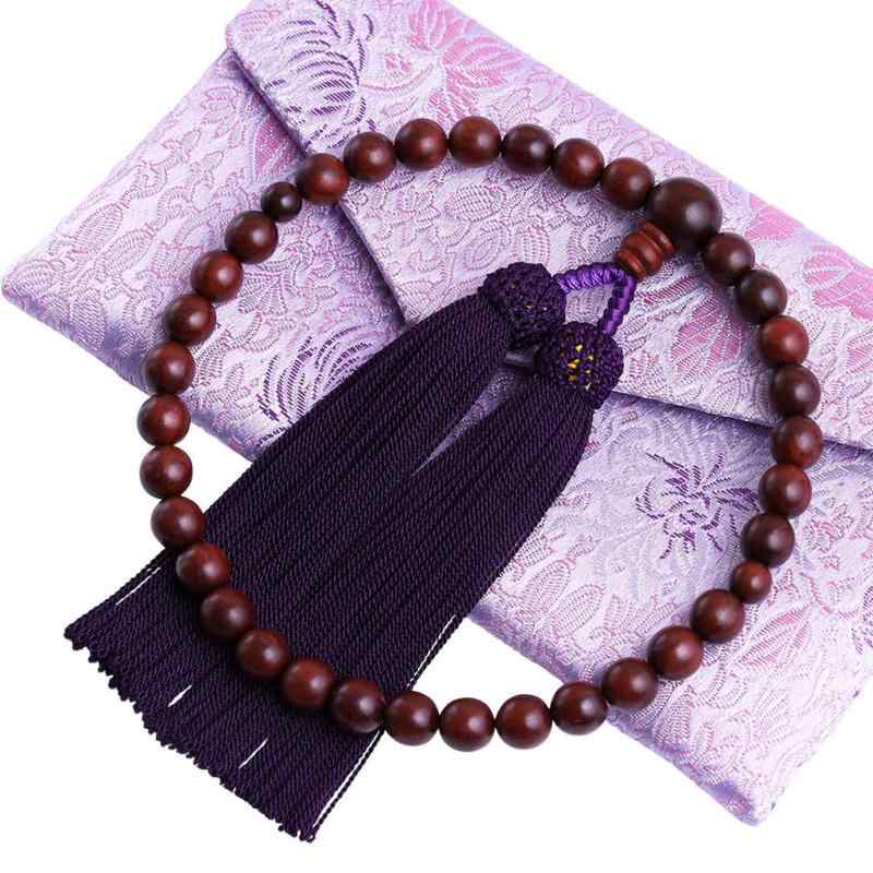 数珠 女性用 天然木 紫檀 黒檀 鉄刀木 マグネット式数珠袋付きじゅず 手作り念珠 葬式 葬儀 墓参り 法事 念誦 全ての宗派に使用可能【高品質な紫檀】耐朽性は極めて優れた紫檀の木から作られた女性用の念珠です。紫檀は色調はかなり変化に富んで...