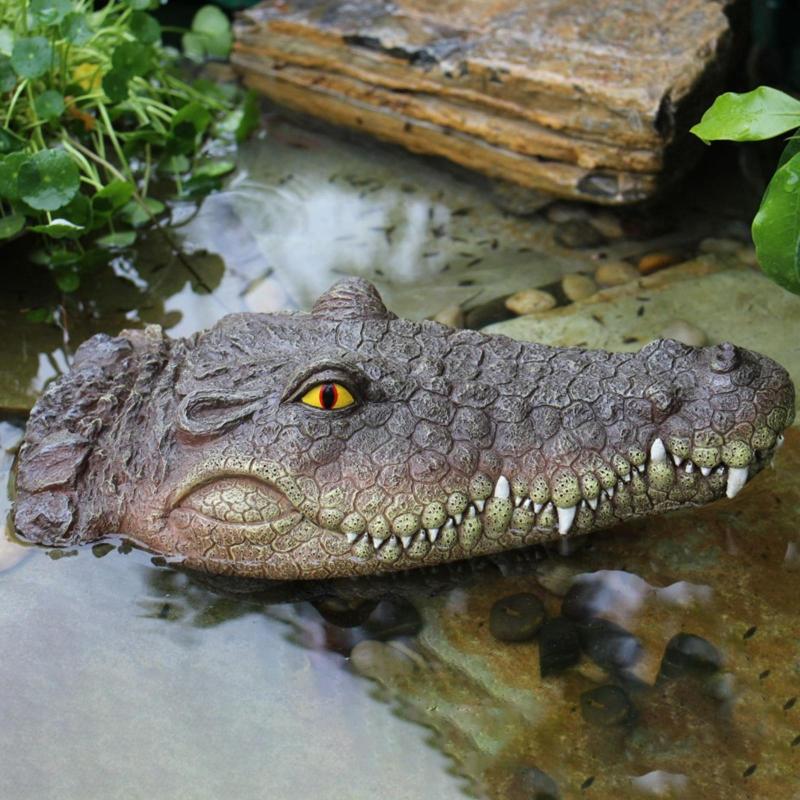 説明: リアルなワニの頭: ワニの頭は精巧な職人技、繊細な肌の質感、本物そっくりの目で、外観は非常にリアルです。抑止力: このフローティング クロコダイル ヘッドは、アヒル、ガチョウ、サギ、鳥などの他の捕食者に対する抑止力として機能し、池に...