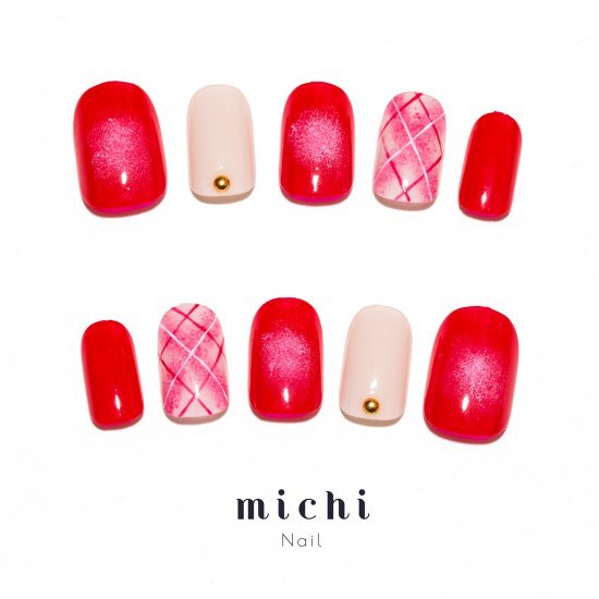 [商品説明]サンタさんカラーのネイルでクリスマス感をだしました。