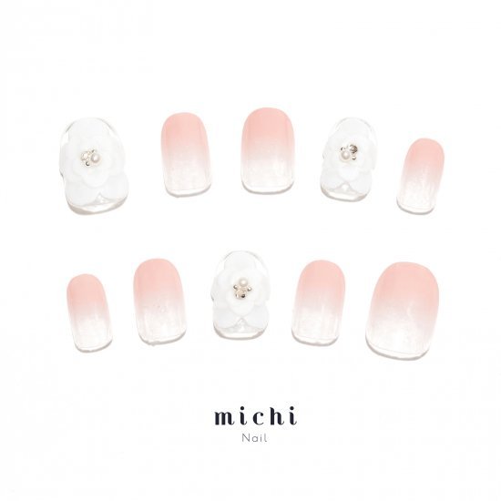 [商品説明]ピンクベージュのグラデーションにクラッシュシェルをちりばめたウエディングやイベントにおすすめのネイルです。