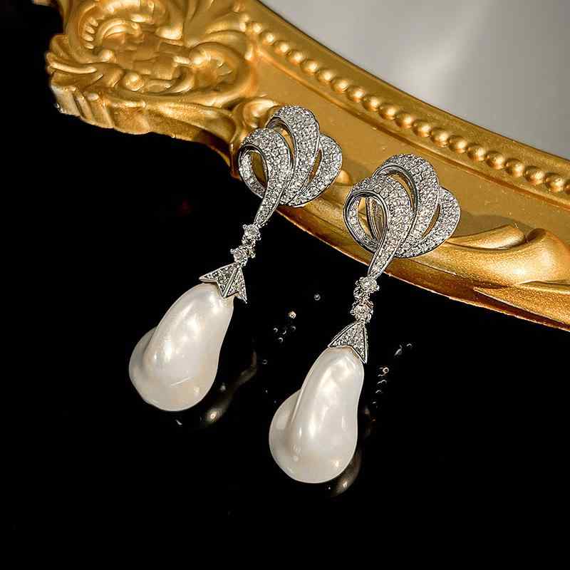 ・主な素材: フェイクパール・デザイン: 花・カラー: ホワイト・流行要素: ユリ、バラ、ツバキ・スタイル: ファッション通勤・カテゴリ: ピアス・イヤリング・対象: 女性