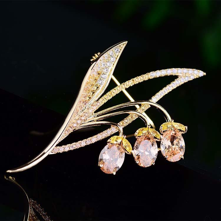 ・種類: ブローチ・スタイル: レディース・主な素材: 銅、ジルコニア・モチーフ: 花・流行要素: スズラン・加工方法: 電鍍・テイスト: 個性的、トレンド・機能: 装飾・カラー展開: グリーン、シャンパン