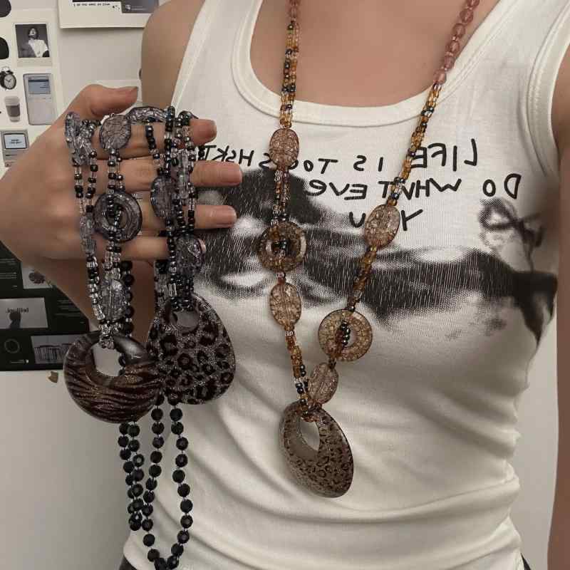 ・主な素材: アクリル・処理プロセス: 電気メッキ・デザイン: 幾何学型・チェーンのデザイン: レギュラーチェーン・ペンダント素材: 合金・周囲: 41cm～50cm・カラー展開: 水滴レオパード、ゼブラ柄、パープルハート、レッドハート、ブ...