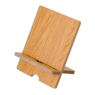 スマホ＆タブレットスタンド（@199円税別 120個単位 メーカー直送品） 動画の視聴やオンライン会議に！ お部屋になじむ木目調スタンド 2枚の板を組み合わせるだけのシンプル構かつ 充電しながら使用もできる親切設計です。 スマホ・タブレット...