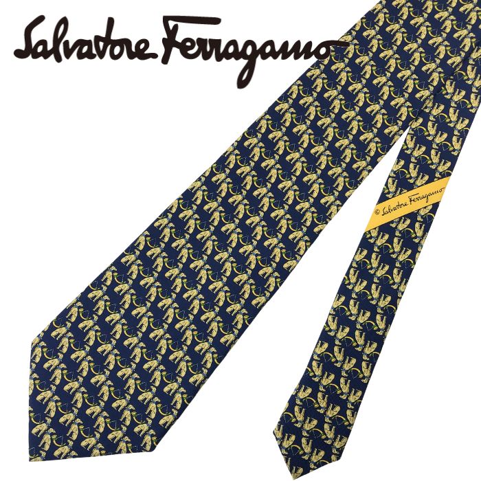■ブランド名 Salvatore Ferragamo サルバトーレフェラガモ ■カテゴリ ＜中古品＞ネクタイ ■対象 メンズ　レディース ■素材 シルク100％ ■カラー ネイビー×イエロー ■サイズ 全長 約146cm 、剣先幅 9.5c...