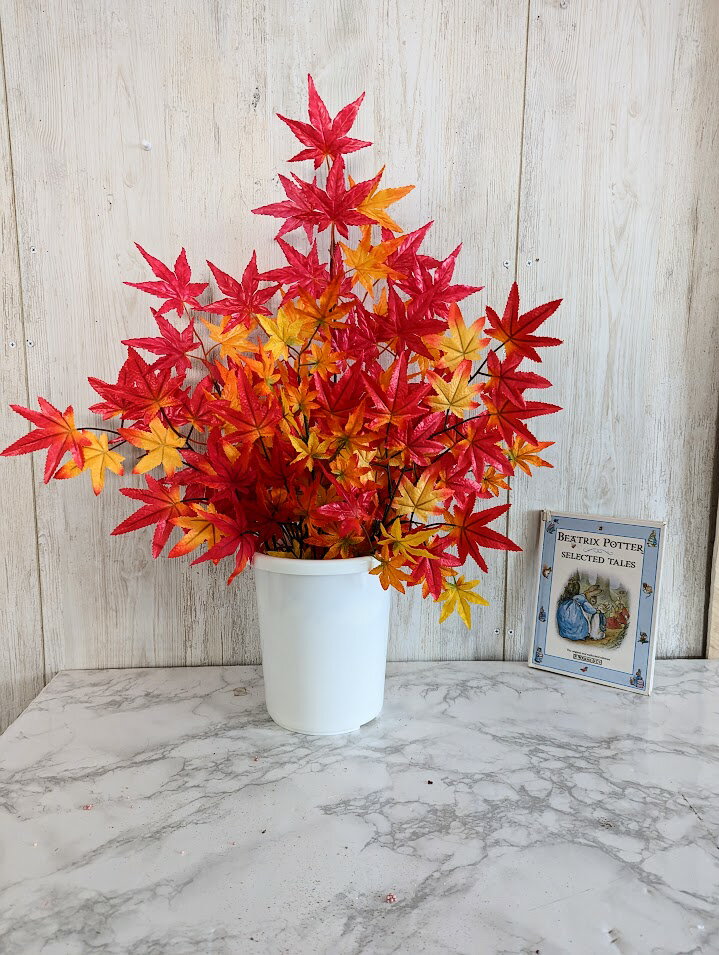 サイズ　高さ60cm　幅45cm 材質　　葉はポリエステル　花卉はプラ鉢