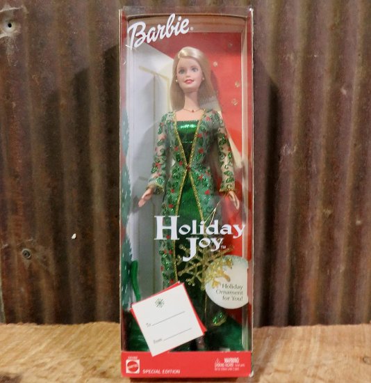 【商品名】Barbie 2003ホリデージョイバービー人形2003 Holiday Joy Barbie Doll【商品説明】・Glamorous Christmas Barbie dressed in a festive long gre...