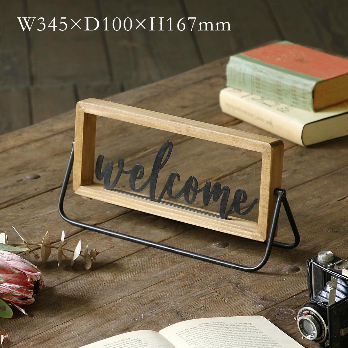 アイアンと木枠の異素材が絶妙な抜け感。造花と組合せてもおしゃれです。玄関口のインテリアとしておすすめです。 サイズ W345×D100×H167mm 素材 フレーム：モミスタンド：アイアン 生産地 中国 備考 アンティーク調で、古びた風合い...