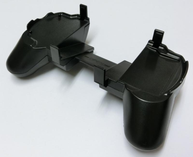 PSP2000/3000用ハンドグリップPSP2000/3000本体用の操作性向上のための外付けグリップです。パッケージ・マニュアルはございません。PSP1000では使用できません。PSP2000/3000専用となります。