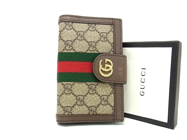 商品情報 ブランド名 GUCCI グッチ 状態ランク ABランク(美品) ライン カラーブラウン系 素材 PVC×レザー サイズ W 約9cm　H 約15cm　D 約2.5cm ポケット中 ポケット×3　カード入れ×2 付属品画像内にあるも...