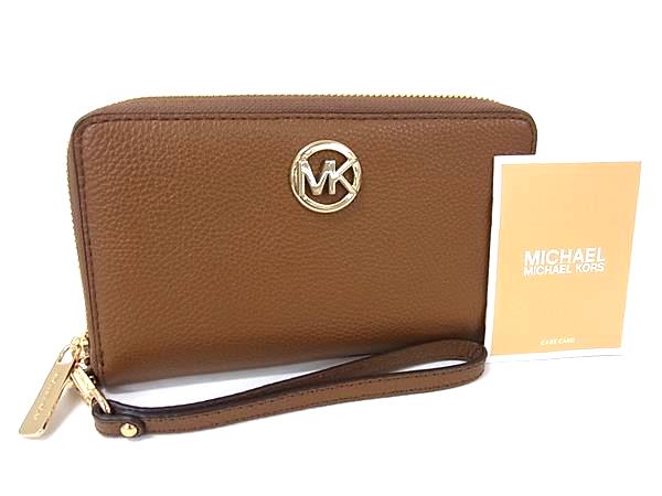 商品情報 ブランド名 MICHAEL KORS マイケルコース 状態ランク Sランク(展示品) ライン カラーブラウン系 素材 レザー サイズ W 約17.7cm　H 約10.4cm　D 約2.2cm ポケット札入れ×2　小銭入れ×1　カー...