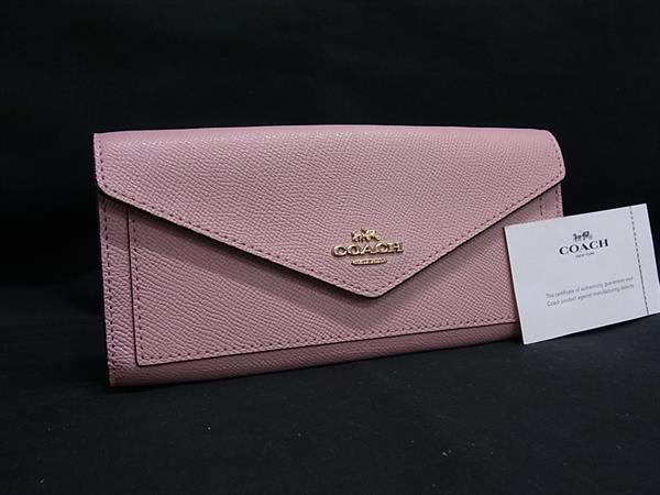 商品情報 ブランド名 COACH コーチ 状態ランク Bランク ライン カラーピンク系 素材 レザー サイズ W 約19.5cm　H 約9cm　D 約1.5cm ポケット中 ポケット×2　札入れ×1　小銭入れ×1　カード入れ×8 付属品画像...