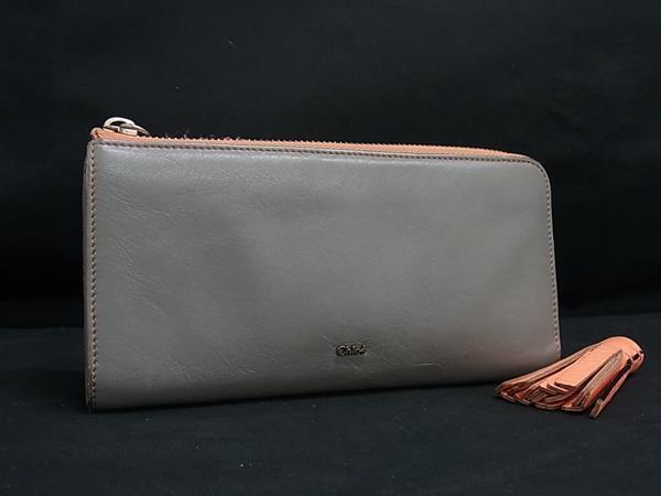 商品情報 ブランド名 Chloe クロエ 状態ランク Bランク ライン カラーグレー系×オレンジ系 素材 レザー サイズ(cm) W 約19cm　H 約9.5cm　D 約2cm サイズ(inch) ポケット中 ポケット×2　札入れ×2　小銭...