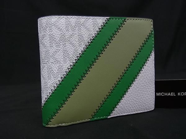 商品情報 ブランド名 MICHAEL KORS マイケルコース 状態ランク SAランク(新品同様) ライン カラーホワイト系×グリーン系 素材 PVC×レザー サイズ W 約11cm　H 約9.5cm　D 約1.5cm ポケット中 ポケット...