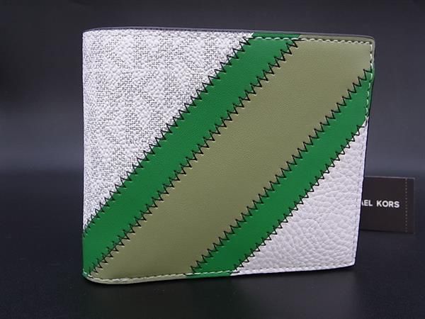 商品情報 ブランド名 MICHAEL KORS マイケルコース 状態ランク Sランク(未使用品) ライン カラーアイボリー系×グリーン系 素材 PVC×レザー サイズ W 約12cm　H 約9.5cm　D 約3.5cm ポケット中 ポケット...