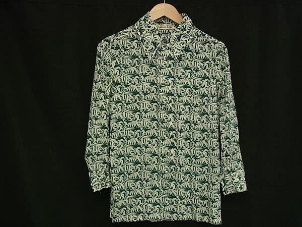 商品情報 ブランド名 ChristianDior クリスチャンディオール 状態ランク Bランク ライン カラーグリーン系×アイボリー系 素材 シルク100% サイズ 表記サイズ:L実寸:総丈 約75cm　着丈 約68.5cm　肩幅 約37c...