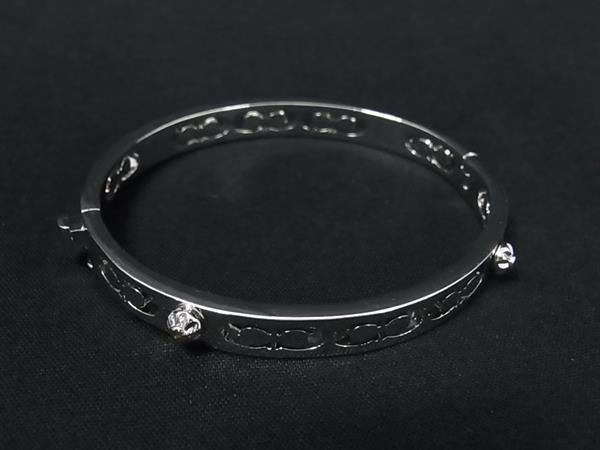 商品情報 ブランド名 COACH コーチ 状態ランク Bランク ライン カラーシルバー系×ゴールド系 素材 サイズ 内周：約16cm　幅：約0.6cm ポケット 付属品画像内にあるものが全てになります シリアル及び刻印 状態使用感　擦れ小　...