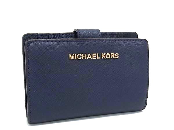 商品情報 ブランド名 MICHAEL KORS マイケルコース 状態ランク ABランク(美品) ライン カラーネイビー系 素材 レザー サイズ W 約13.5cm　H 約9cm　D 約2.5cm ポケット中 ポケット×3　札入れ×1　小銭入...
