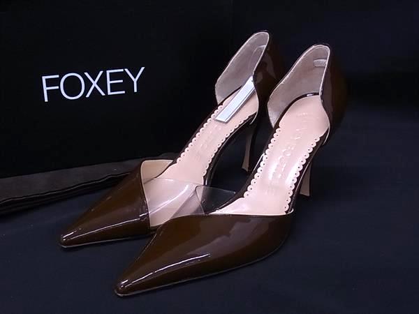 商品情報 ブランド名 FOXY フォクシー 状態ランク Aランク(美品) ライン カラーブラウン系 素材 パテントレザー×PVC サイズ 表記サイズ:35 1/2(日本サイズ約22.5cm)アウトソール 約26cm　ヒールの高さ 約8.5c...