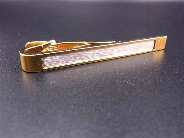 商品情報 ブランド名 dunhill ダンヒル 状態ランク Aランク(美品) ライン カラーゴールド系×シルバー系 素材 サイズ(cm) 全長:約6cm サイズ(inch) ポケット 付属品画像内にあるものが全てになります シリアル及び刻印...