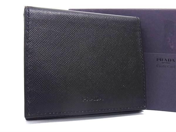 商品情報 ブランド名 PRADA プラダ 状態ランク SAランク(新品同様) ライン カラーブラック系 素材 サフィアーノレザー サイズ W 約10.5cm　H 約8.5cm　D 約2cm ポケット中 ポケット×4　札入れ×1　小銭入れ×1...