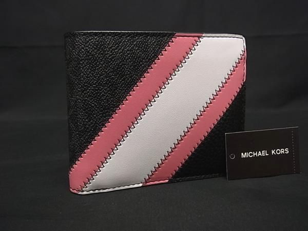 商品情報 ブランド名 MICHAEL KORS マイケルコース 状態ランク Sランク(未使用品) ライン カラーブラック系×ピンク系×ホワイト系 素材 PVC×レザー サイズ(cm) W 約11cm　H 約9.4cm　D 約2cm サイズ(...