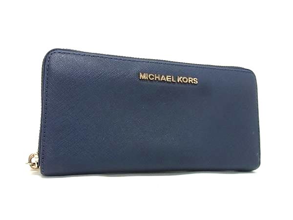 商品情報 ブランド名 MICHAEL KORS マイケルコース 状態ランク ABランク(美品) ライン カラーネイビー系 素材 レザー サイズ W 約20.2cm　H 約10cm　D 約2cm ポケット中 ポケット×2　札入れ×2　小銭入れ...