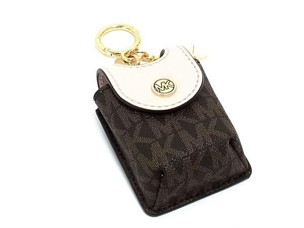 商品情報 ブランド名 MICHAEL KORS マイケルコース 状態ランク Sランク(展示品) ライン カラーブラウン系×ピンク系 素材 PVC×レザー サイズ W 約6cm　H 約6.5cm　D 約3cm ポケット 付属品画像内にあるもの...