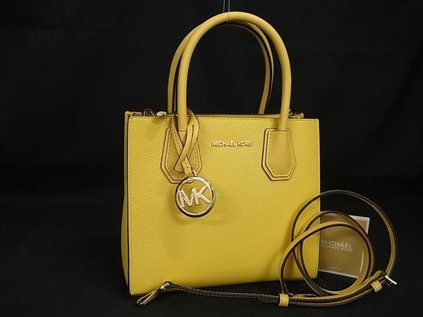 商品情報 ブランド名 MICHAEL KORS マイケルコース 状態ランク Sランク(未使用品) ライン カラーイエロー系 素材 レザー サイズ W 約22cm　H 約19cm　D 約10.5cm ポケット中 ファスナーポケット×1　カード...