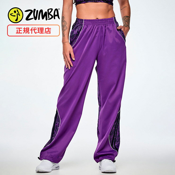 ZUMBAウェアの2026年秋冬新作【ZUMBA Rock'n'Roll Curvy Track Pants (Z1B000907)】サイドライン切替の鮮やかなパープル色トラックパンツです。バックスタイルは大胆なパイソン総柄デザイン！正規品...